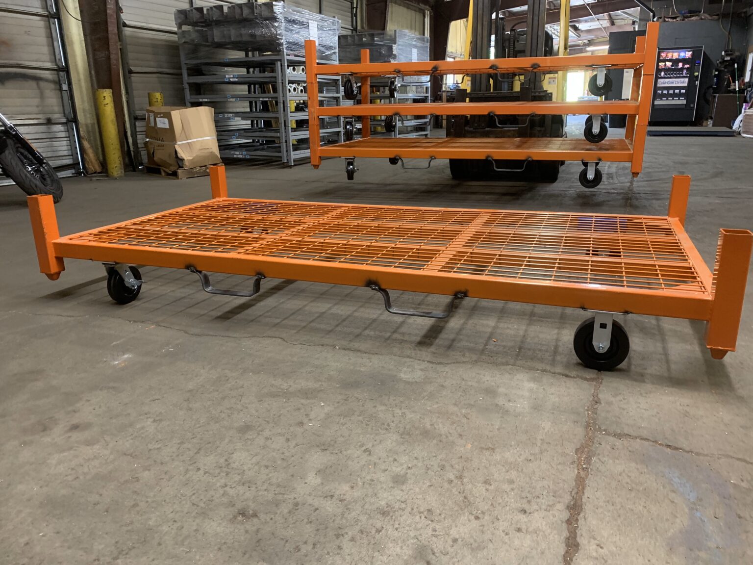 Stack Racks with Casters and Fork Stirrups