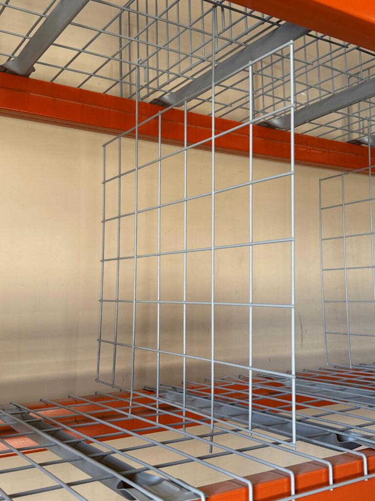 Snap-In vs. Hanging Wire Shelf Dividers for Pallet Rack