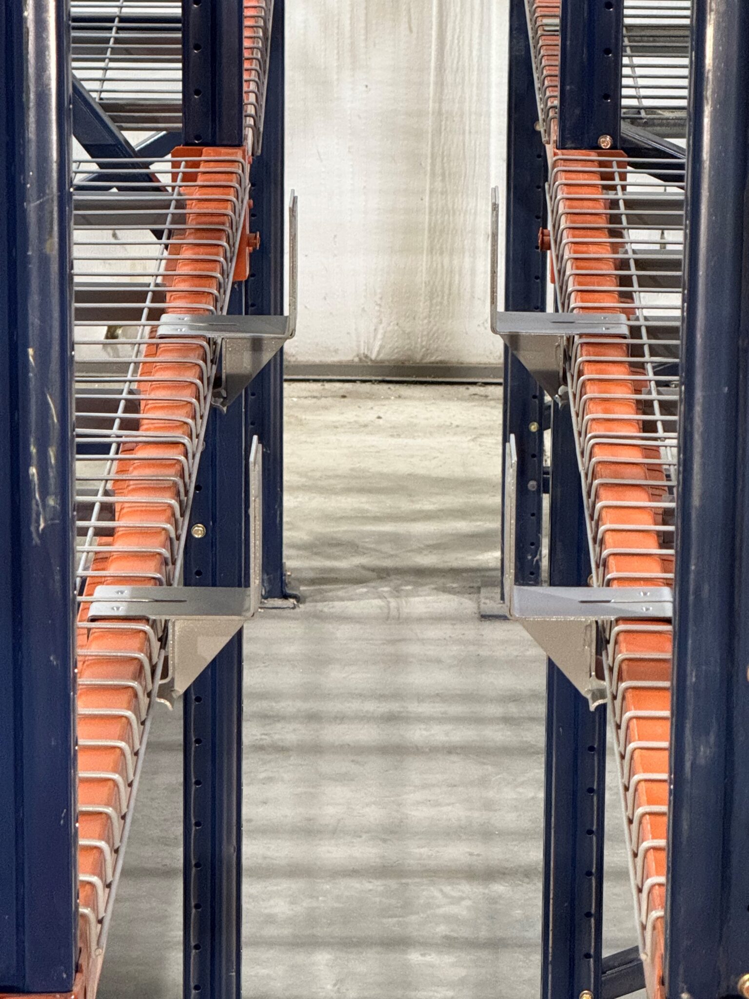 Single Pallet Stops for Flue Space Protection in Back-to-Back Rows of ...