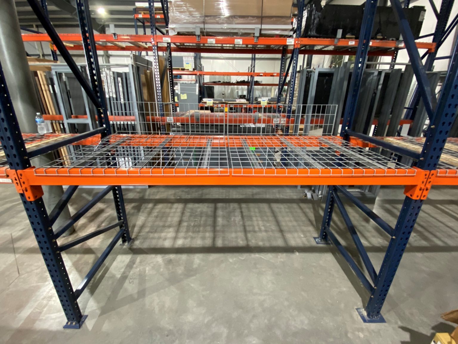 Snap-In Wire Backstops for Wire Decking Contain Boxes & Cartons