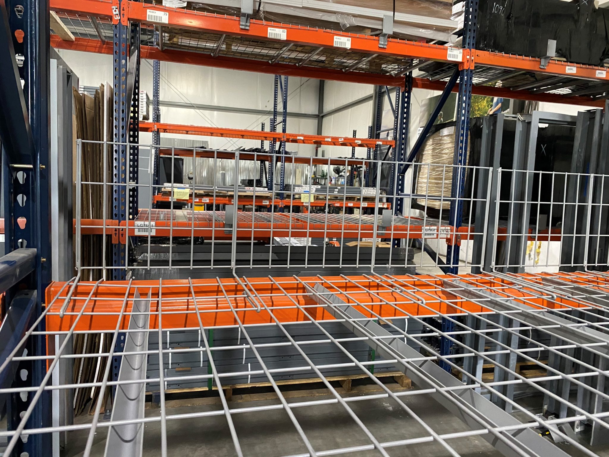 Snap-In Wire Backstops for Wire Decking Contain Boxes & Cartons