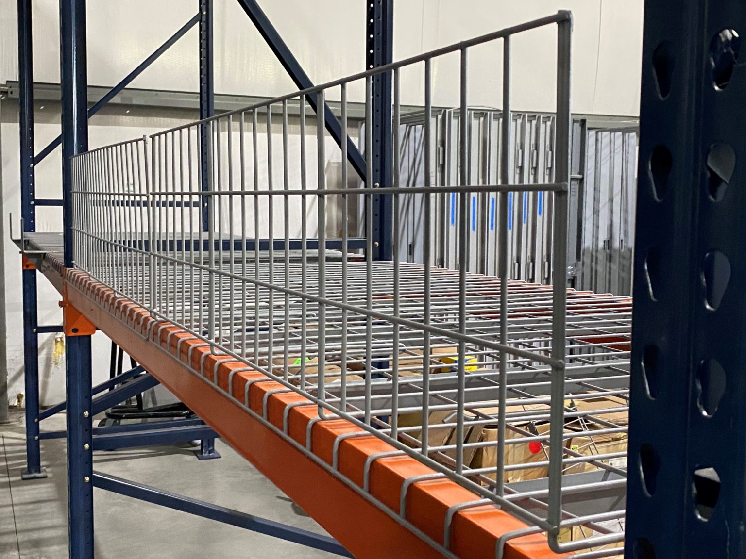 Snap-In Wire Backstops for Wire Decking Contain Boxes & Cartons