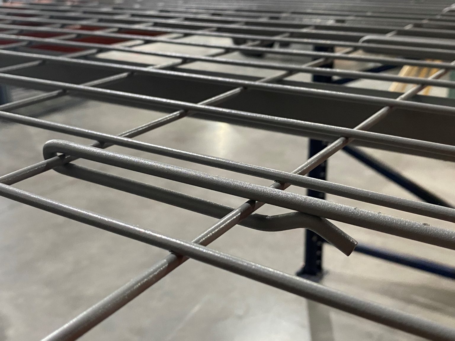 Snap-In Wire Backstops for Wire Decking Contain Boxes & Cartons