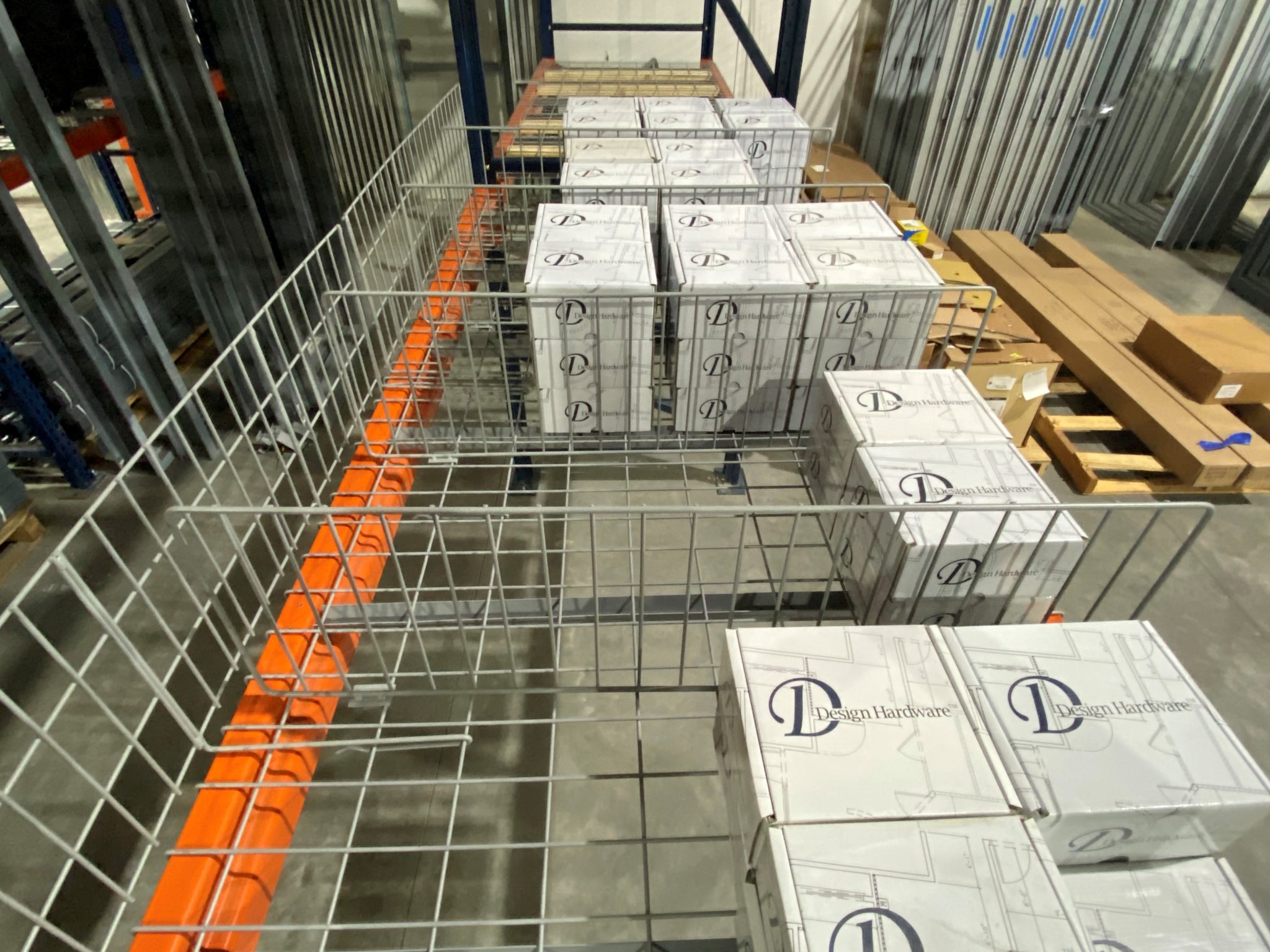 Snap-In Wire Backstops for Wire Decking Contain Boxes & Cartons