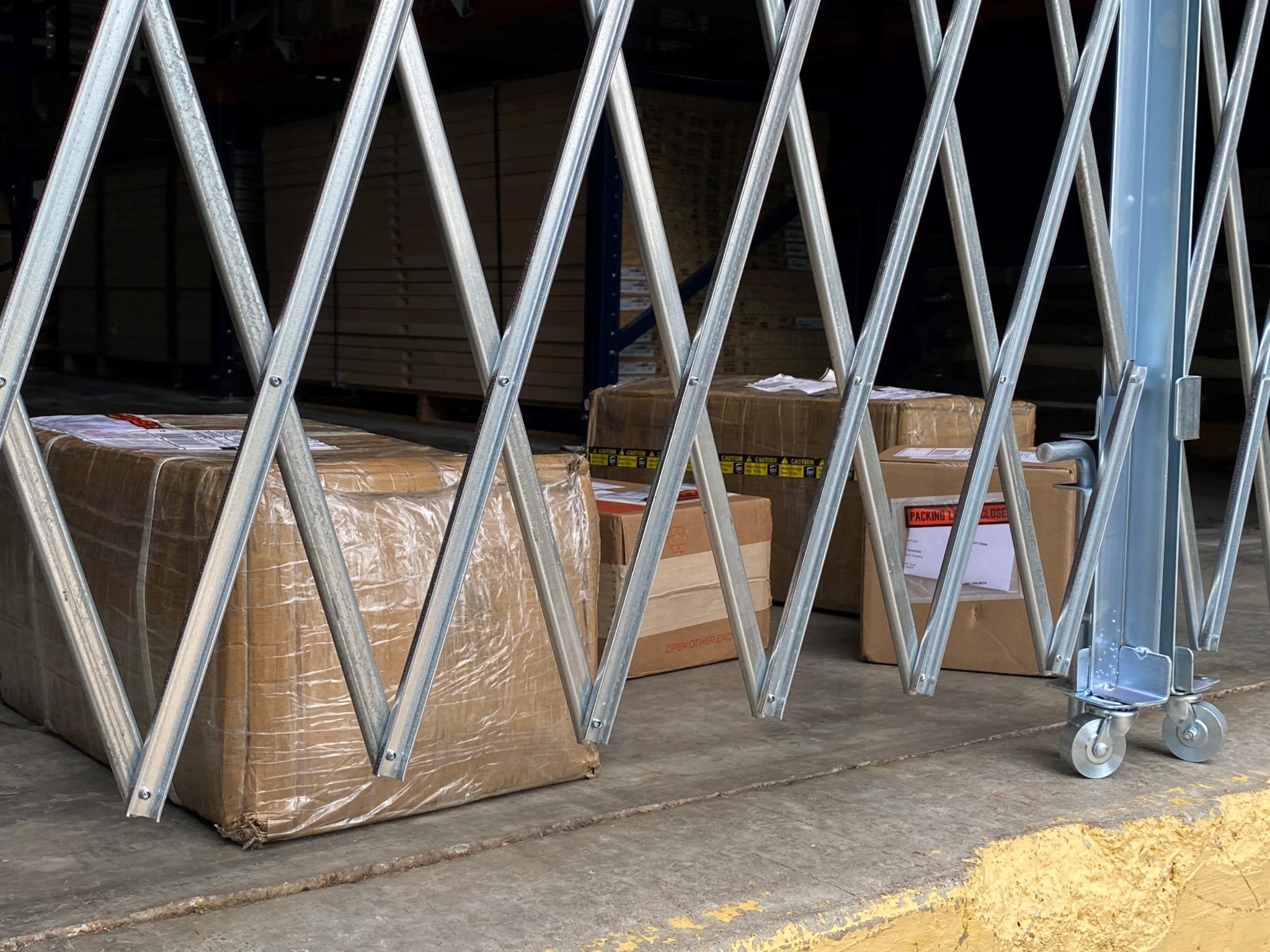 Security Scissor Gates for Warehouse Loading Dock Doors